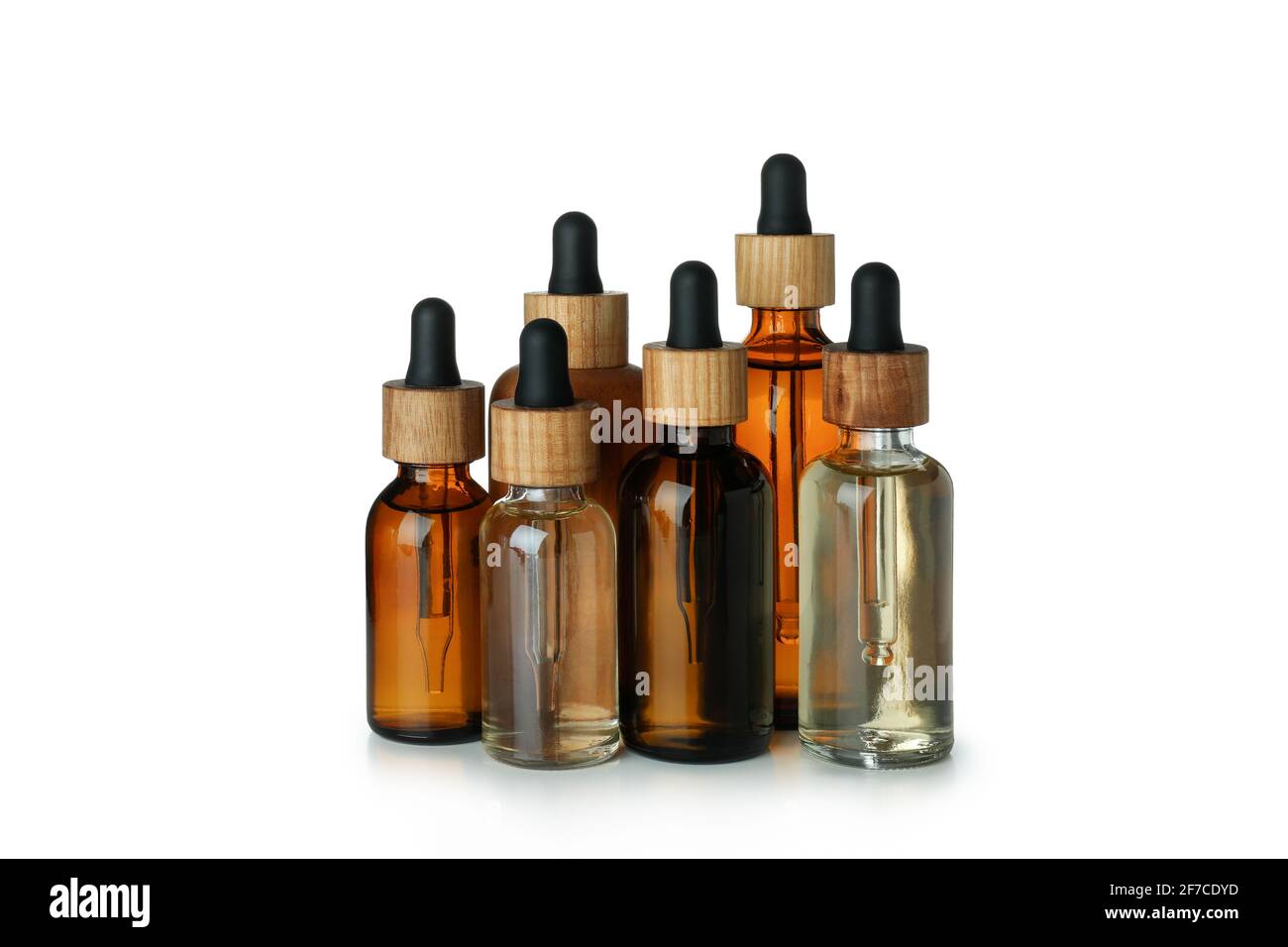 Dropper bottles with oil isolated on white background Stock Photo - Alamy