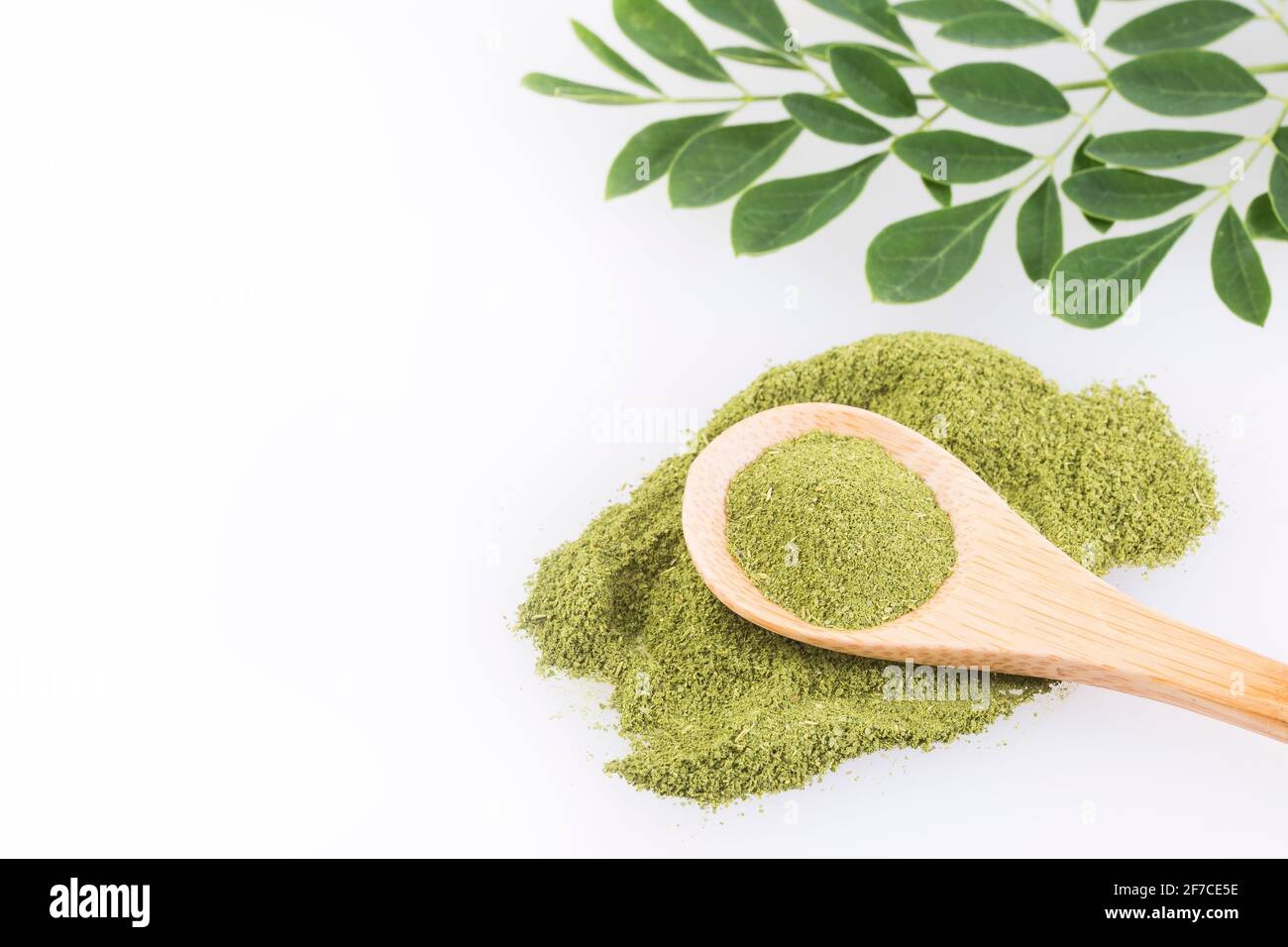 Fresh leaves and moringa powder - Moringa oleifera. Top view Stock ...