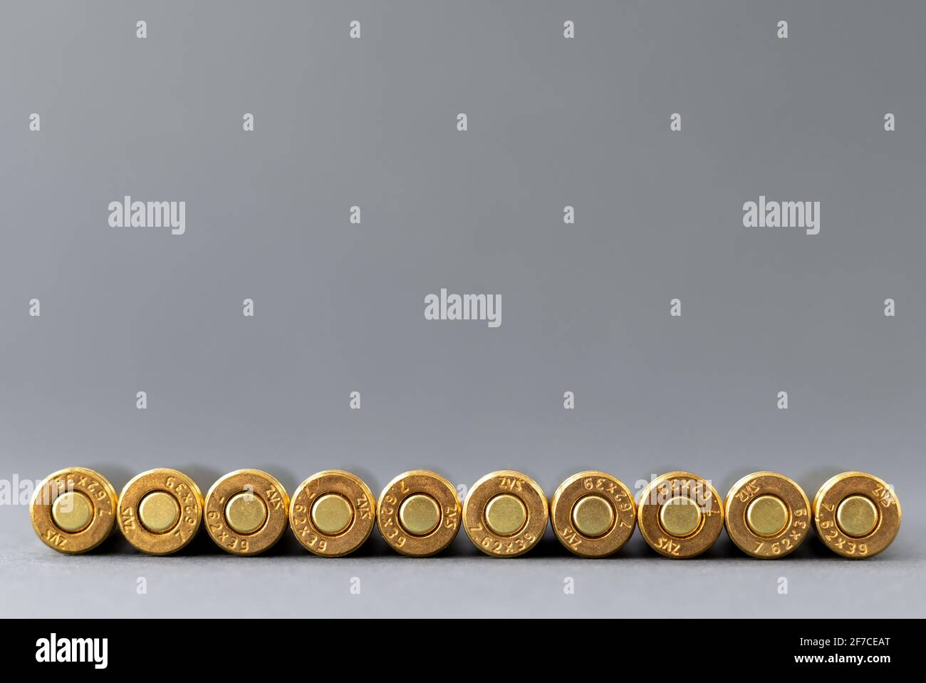 Bullets bottom on gray background. Cartridges 7.62 caliber for ...