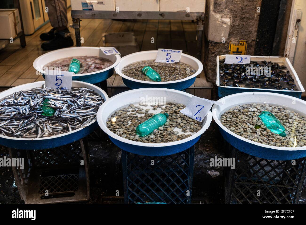 Fish and clam stall on a street in the old town of Naples, Italy Stock ...