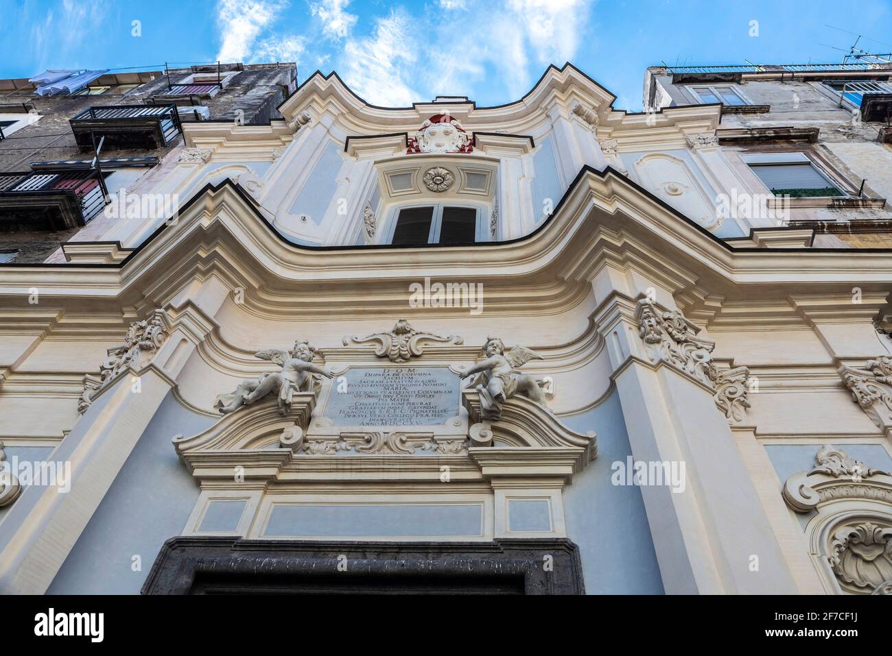 Facade of an old classic building in the historical center of Naples ...
