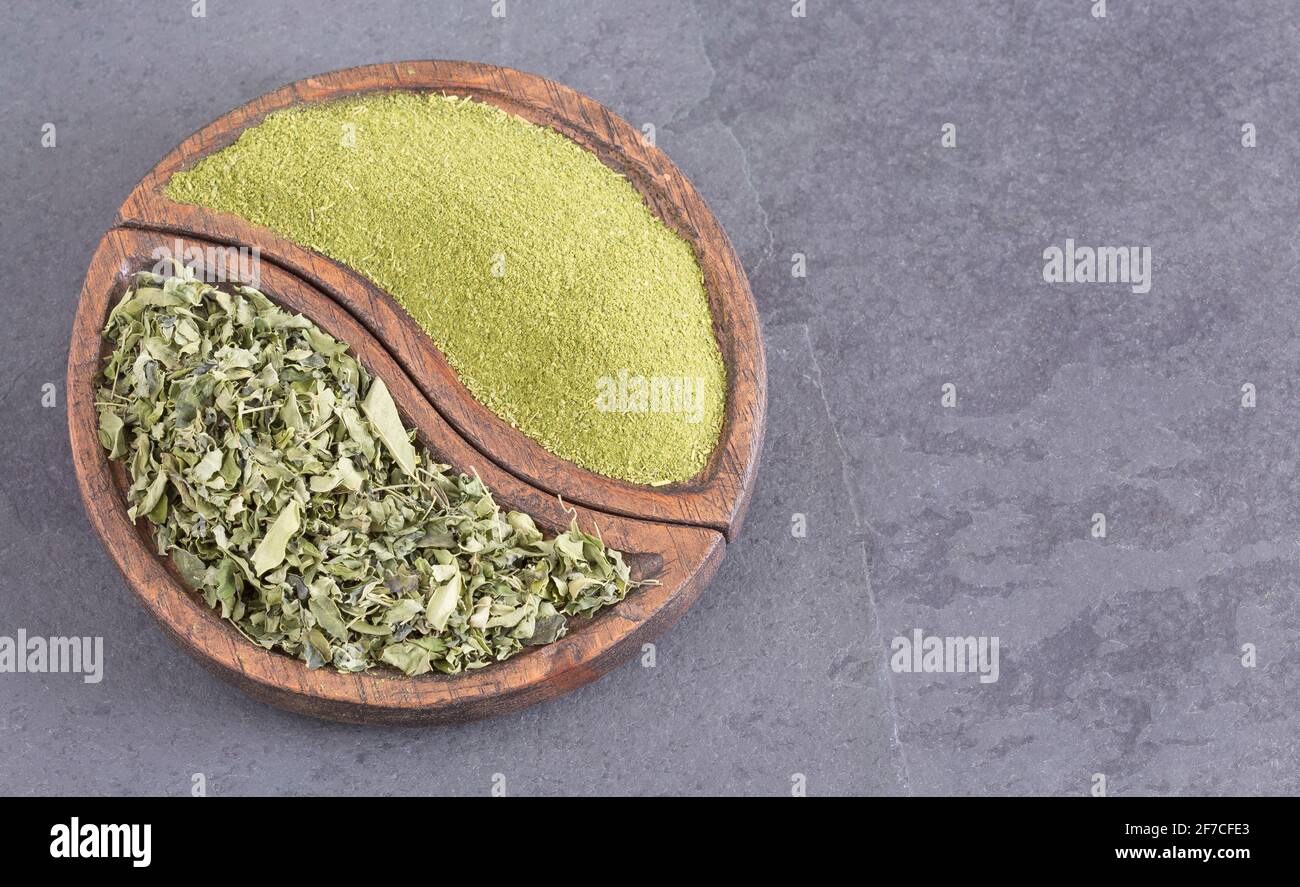 Fresh leaves and moringa powder - Moringa oleifera. Top view Stock ...