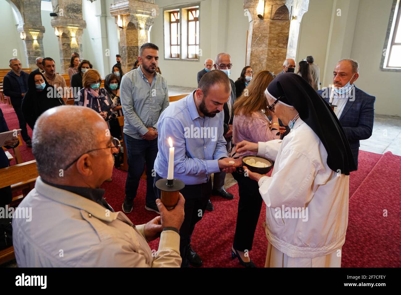 Receive holy communion hi-res stock photography and images - Alamy