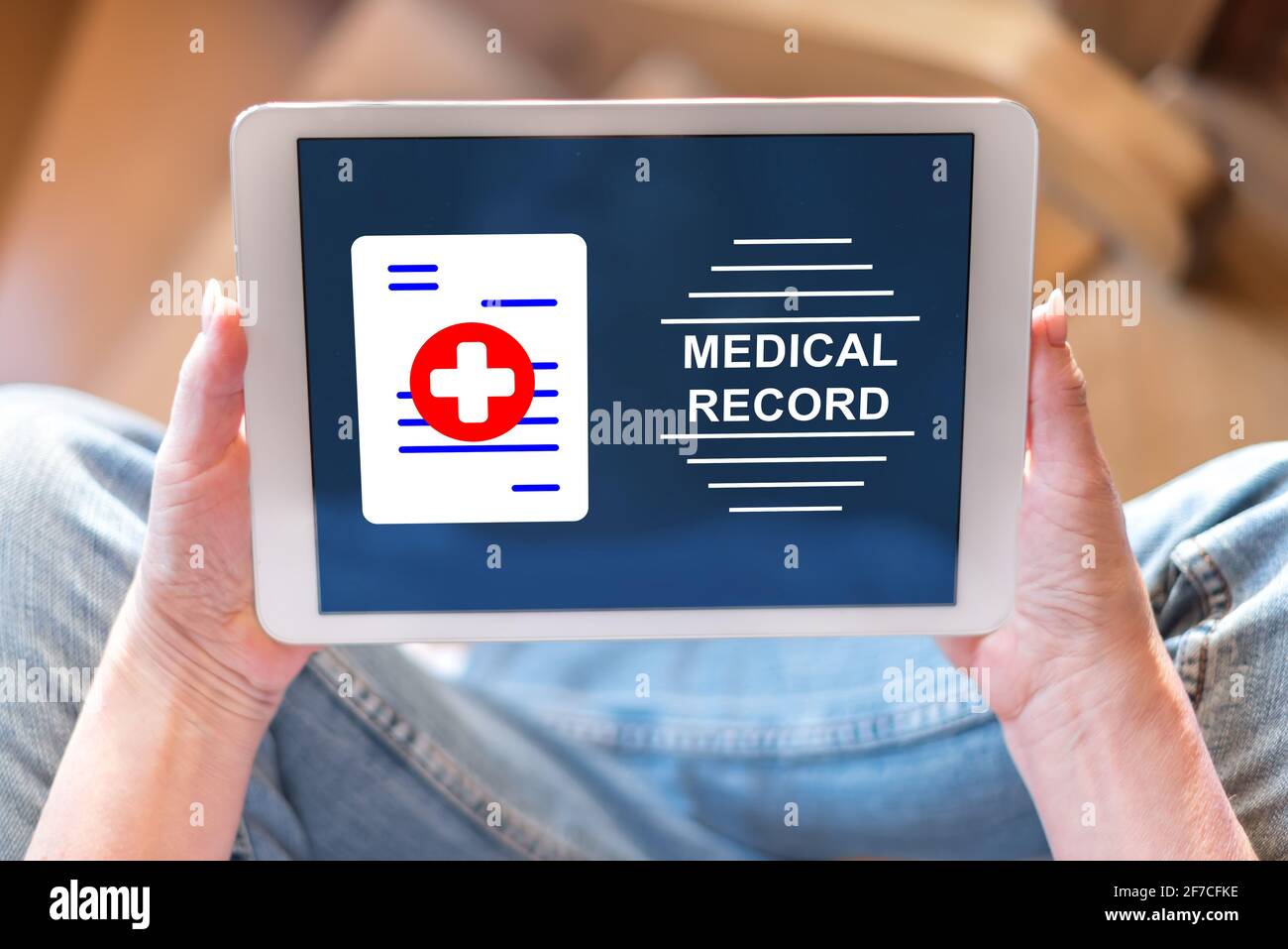 Tablet screen displaying a medical record concept Stock Photo - Alamy