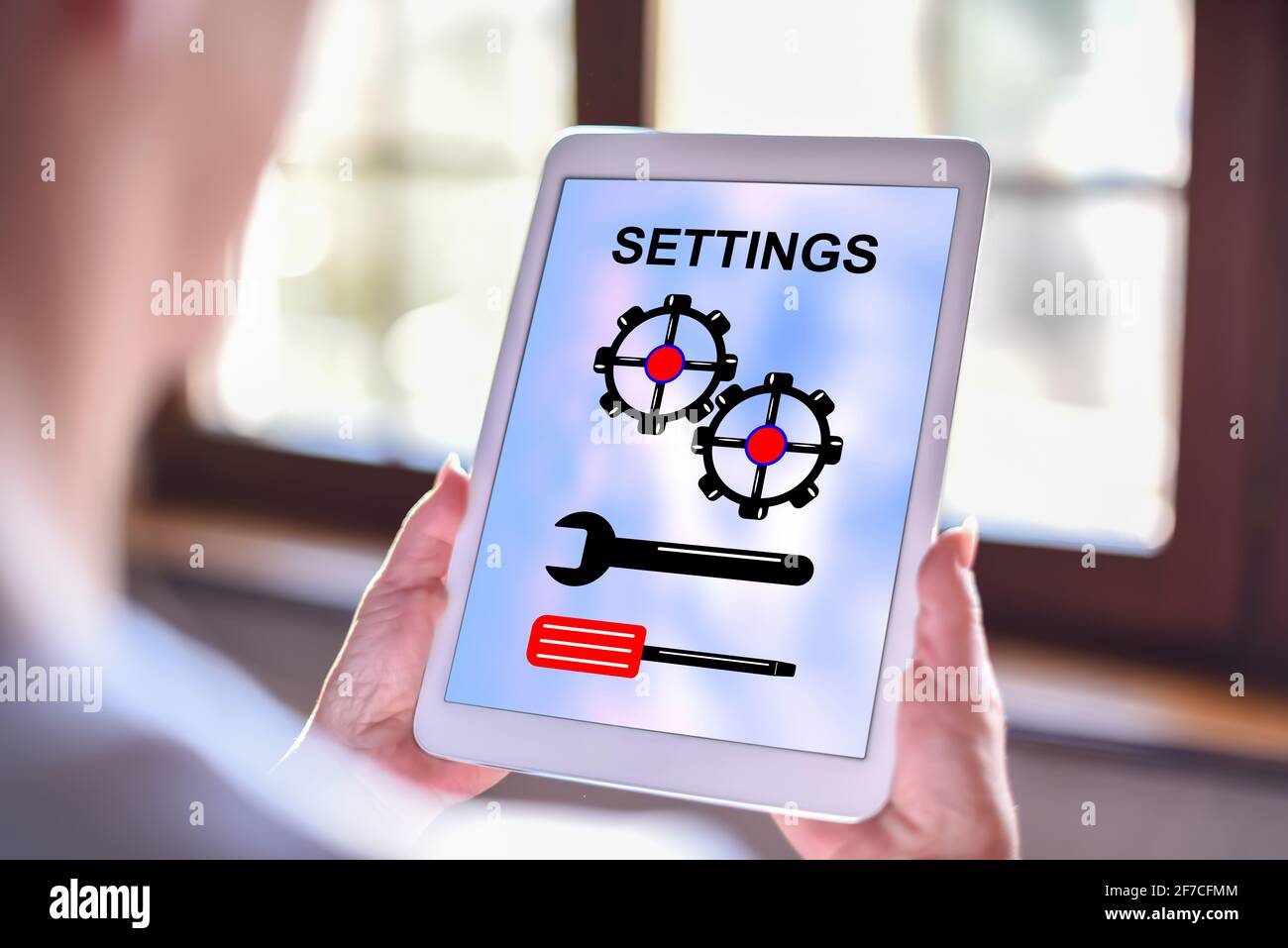 Tablet screen displaying a settings concept Stock Photo - Alamy