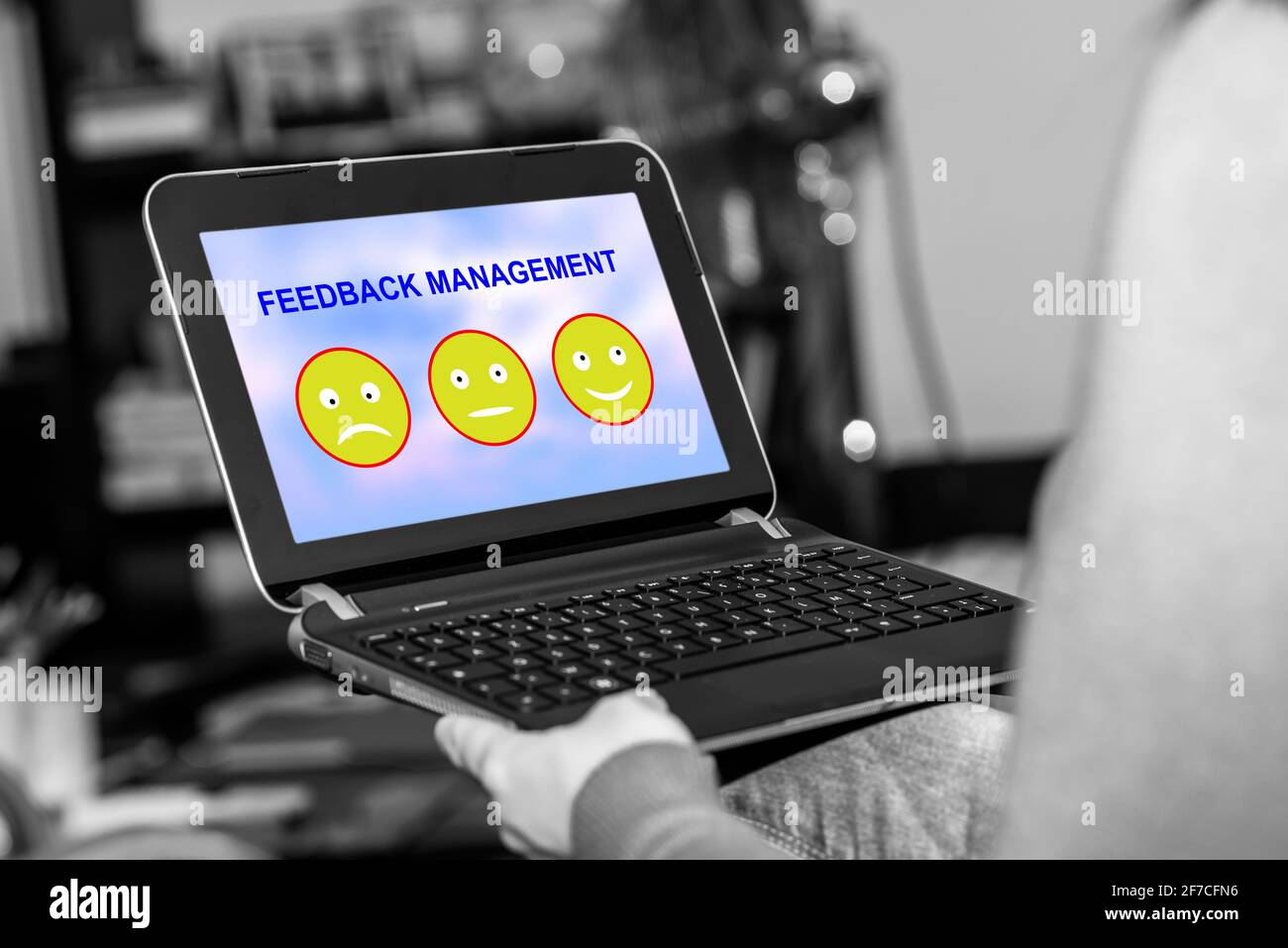 Tablet screen displaying a feedback management concept Stock Photo - Alamy