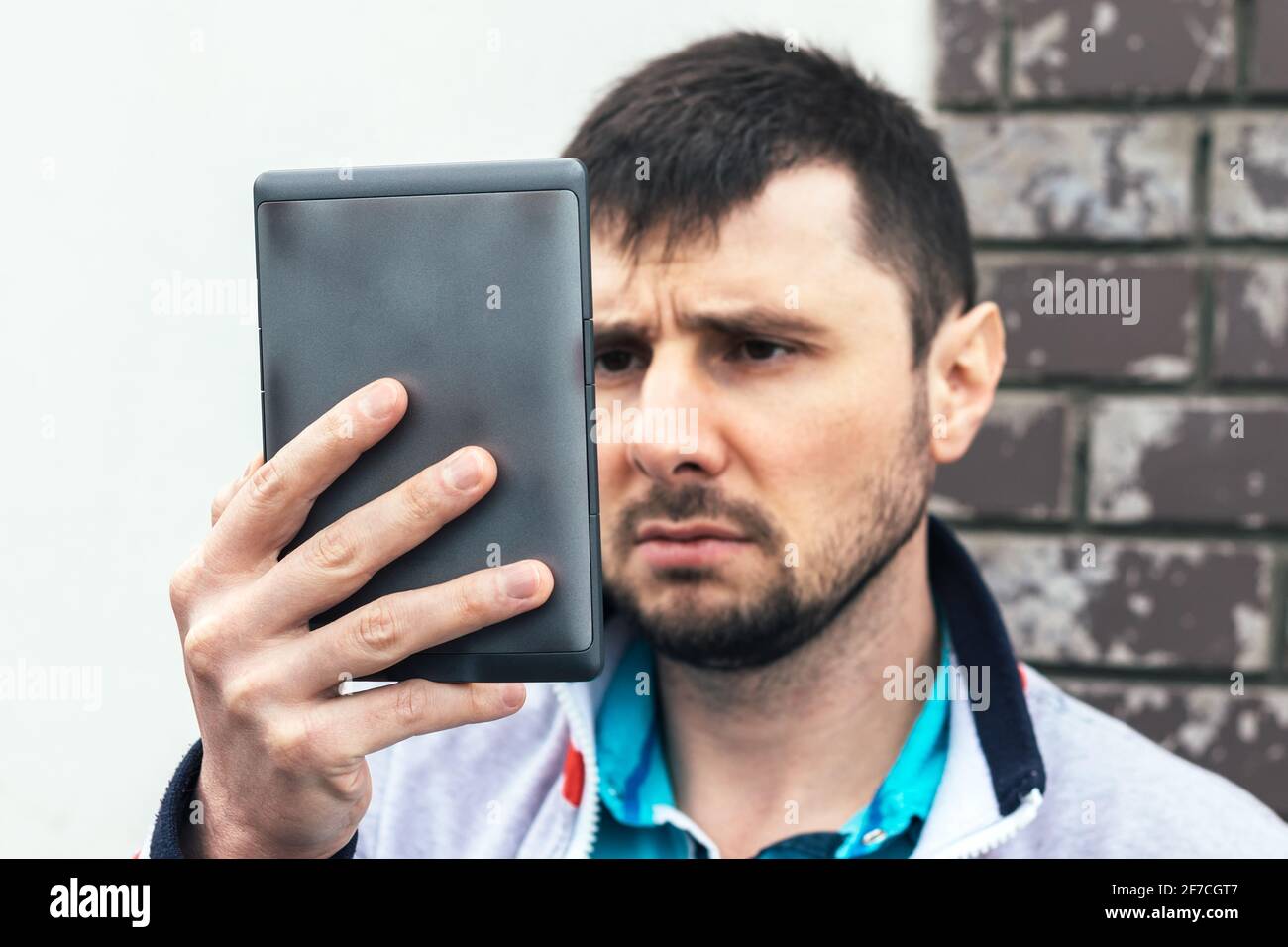 Man reading book face hi-res stock photography and images - Alamy