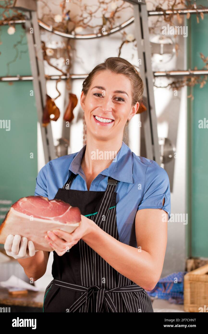 Female butcher standing hi-res stock photography and images - Alamy