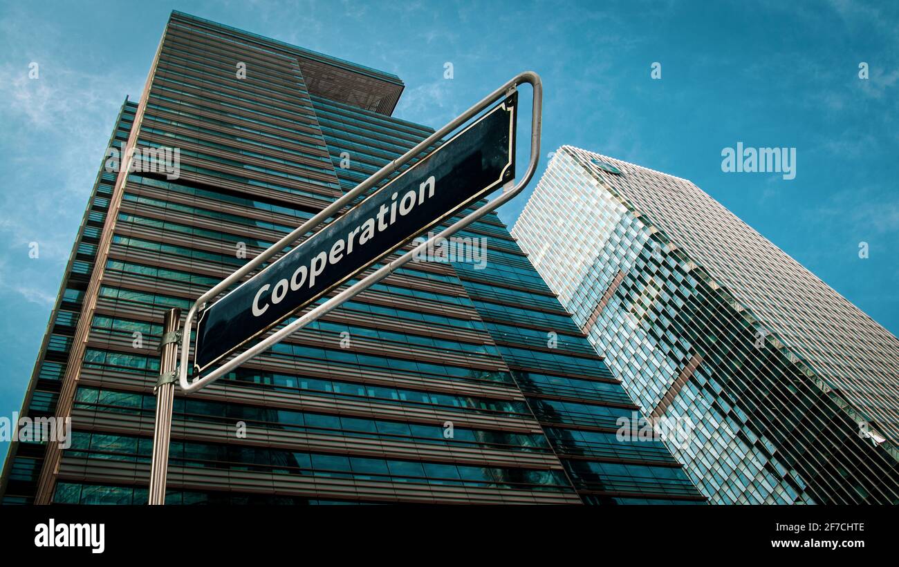 Street Sign the Direction Way to Cooperation Stock Photo - Alamy
