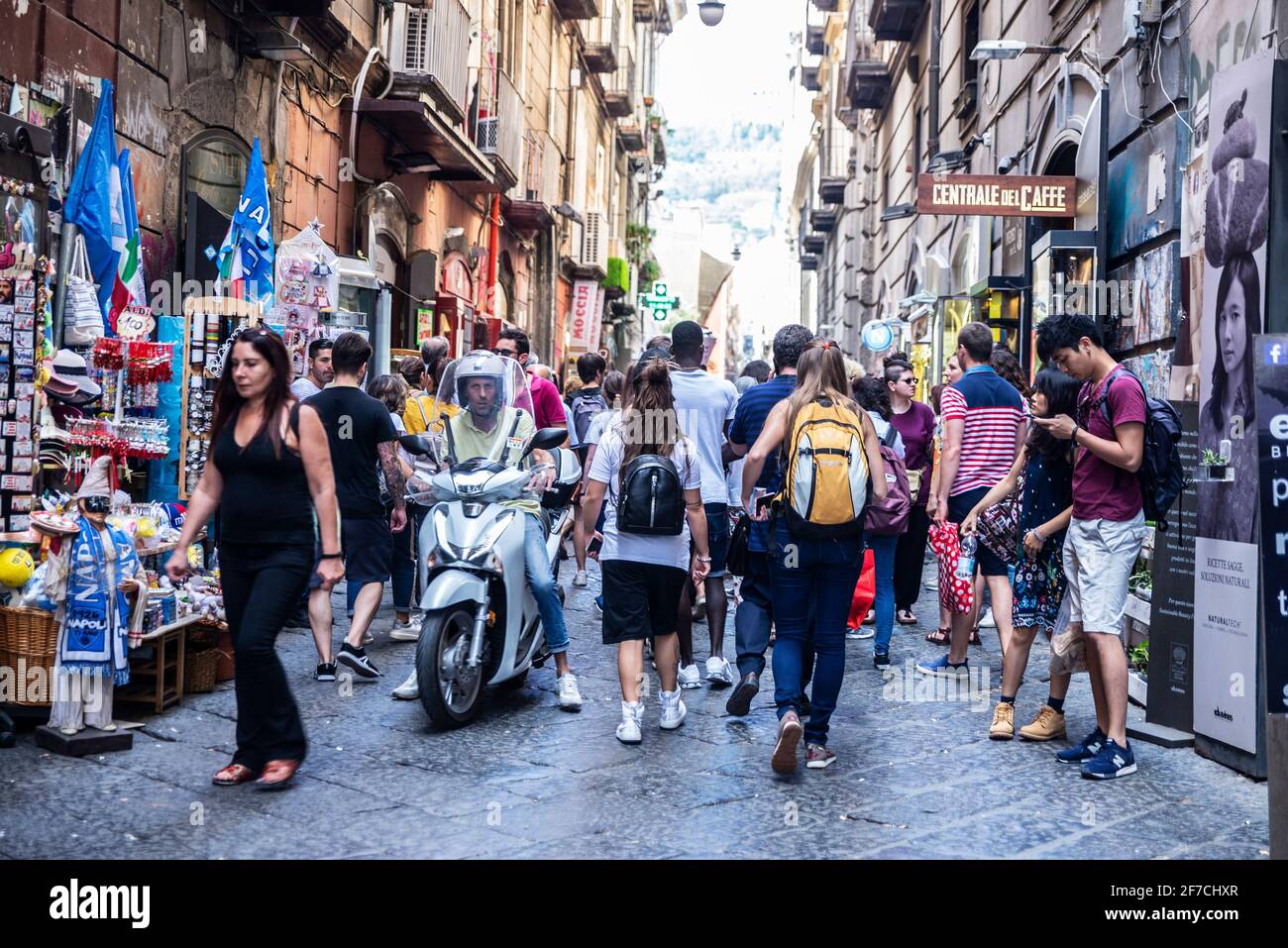 Naples, Italy - September 10, 2019: Spaccanapoli, narrow shopping street with people around in ...