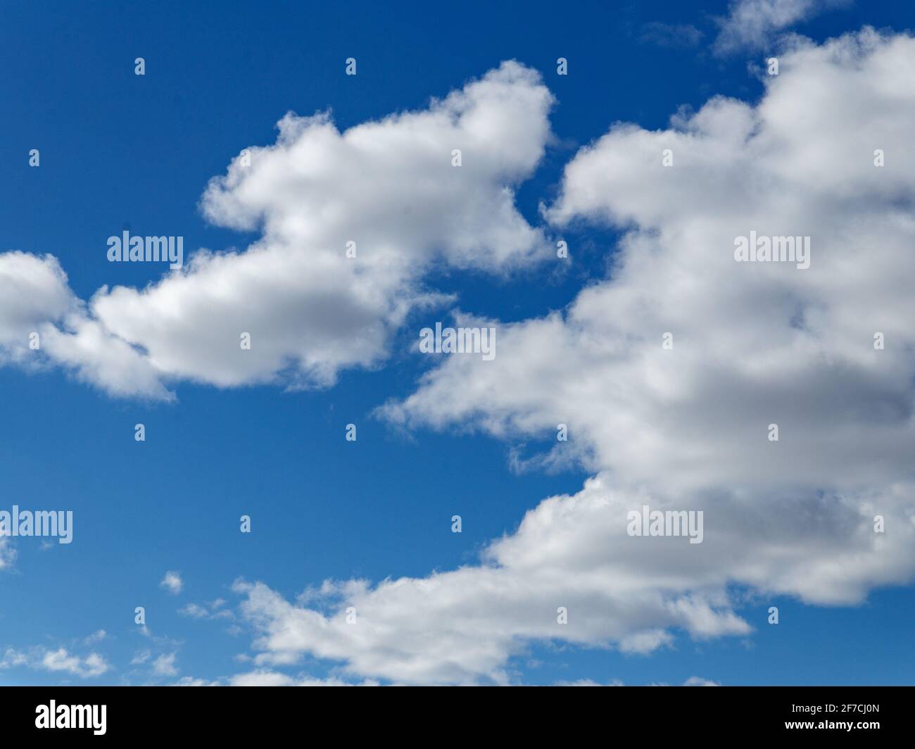 Clouds in blue sky on hi-res stock photography and images - Alamy