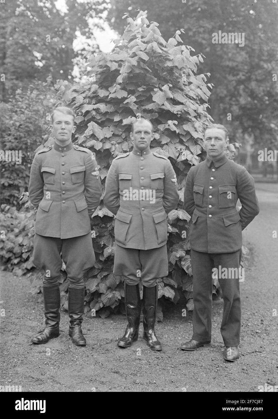 Three men in park Black and White Stock Photos & Images - Alamy