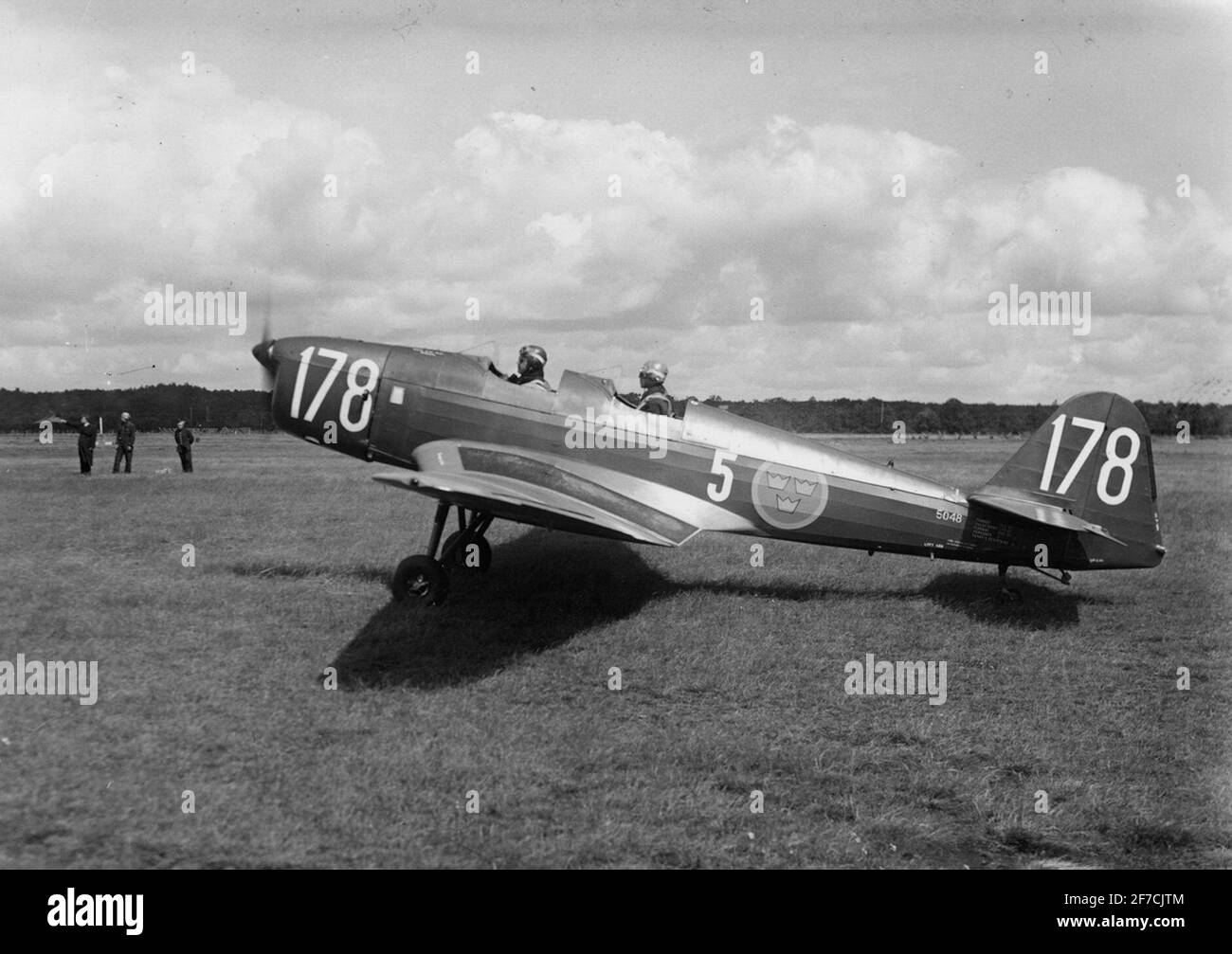 SK 15 with flight drivers and flying elevations on an airfield, 1940s ...