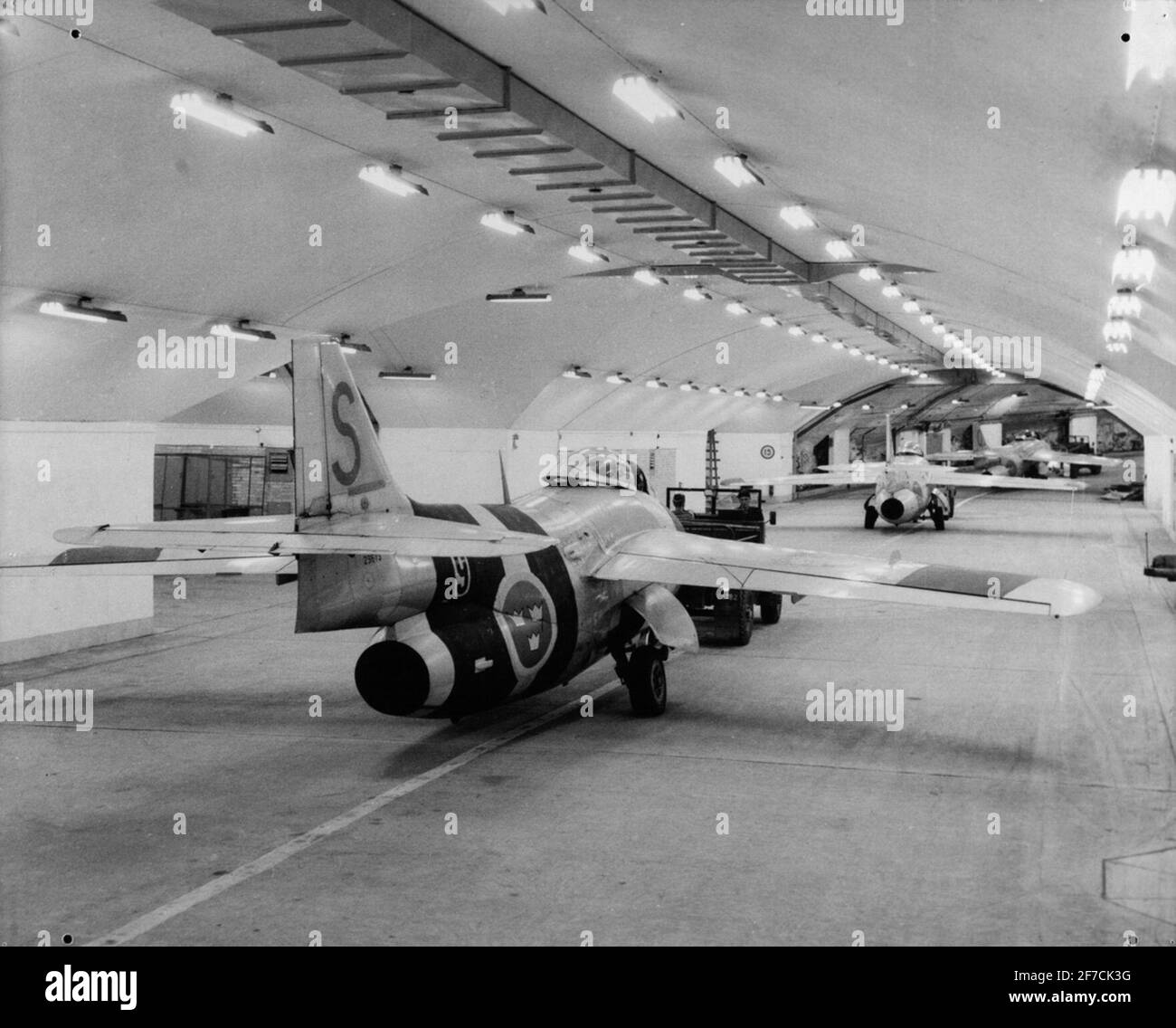 Three pieces of aircraft J 29 The barrel is towed into hangar on F 9 ...