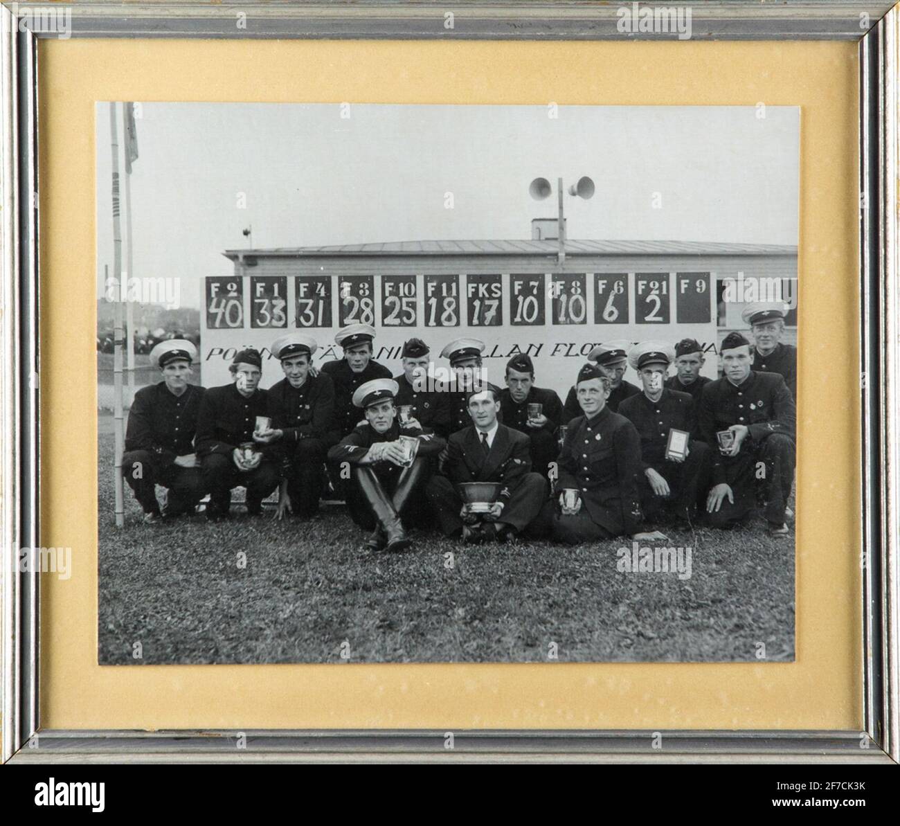 Group portrait of laureate at prize competition between flight fleet ...