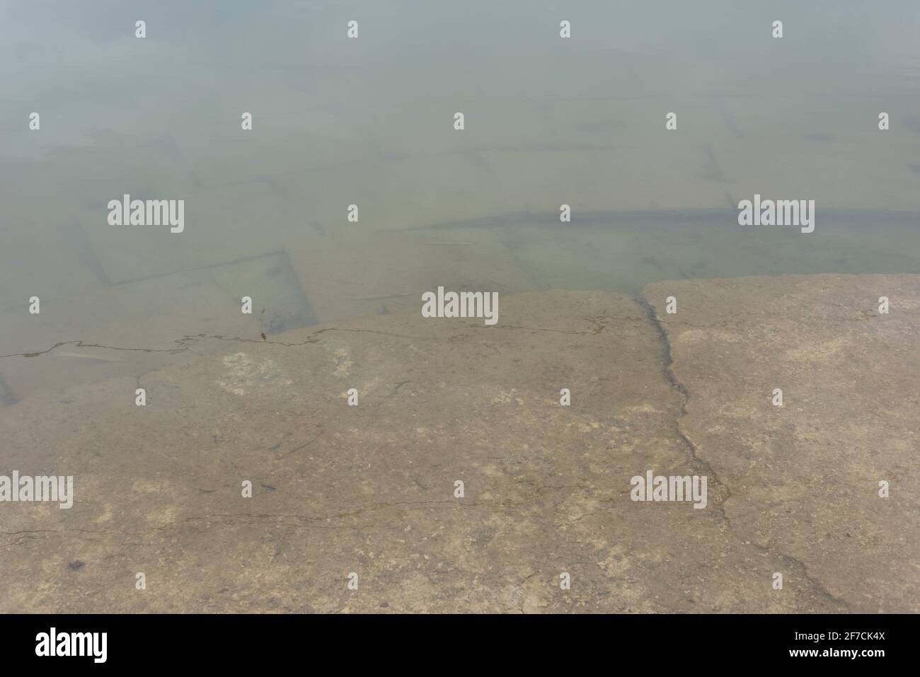 concrete slab under dirty water sump down Stock Photo - Alamy