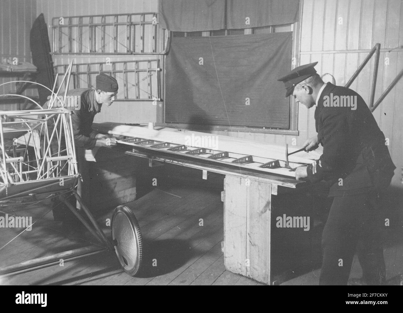 Building of aircraft Holmberg Racer motif: Airplane building. Fabric ...