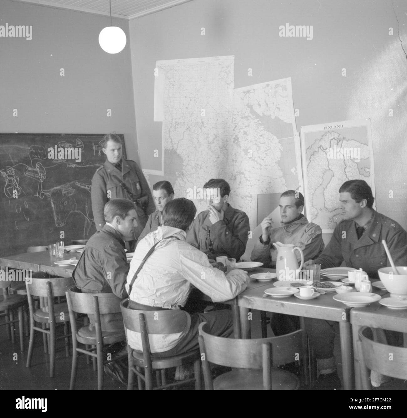 Military at dining table in the combined dining room and the order room ...
