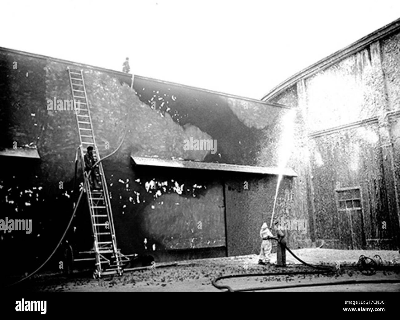Fire exercise at hangar on f 2, 1942 Extinguishing work against wall at ...
