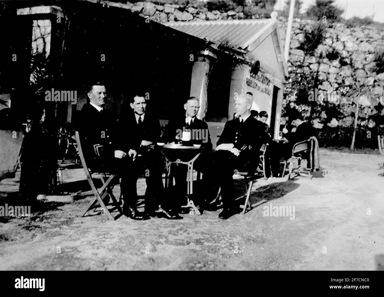 Four Swedish officers from the Air Force sitting at a cafe table U Four ...