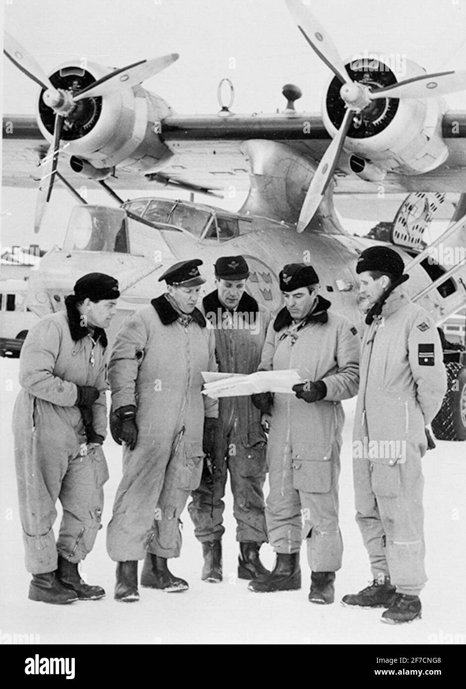 Group of crew on airplane TP 47 Catalina Group image of crew on ...