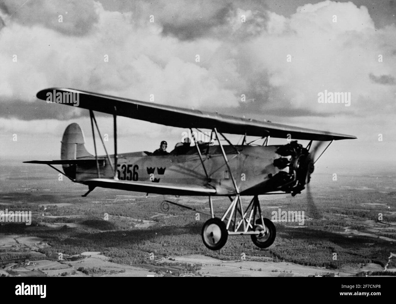 S 6a flying over fields, 1933 . airplane s 6a marked number 5356 flying ...