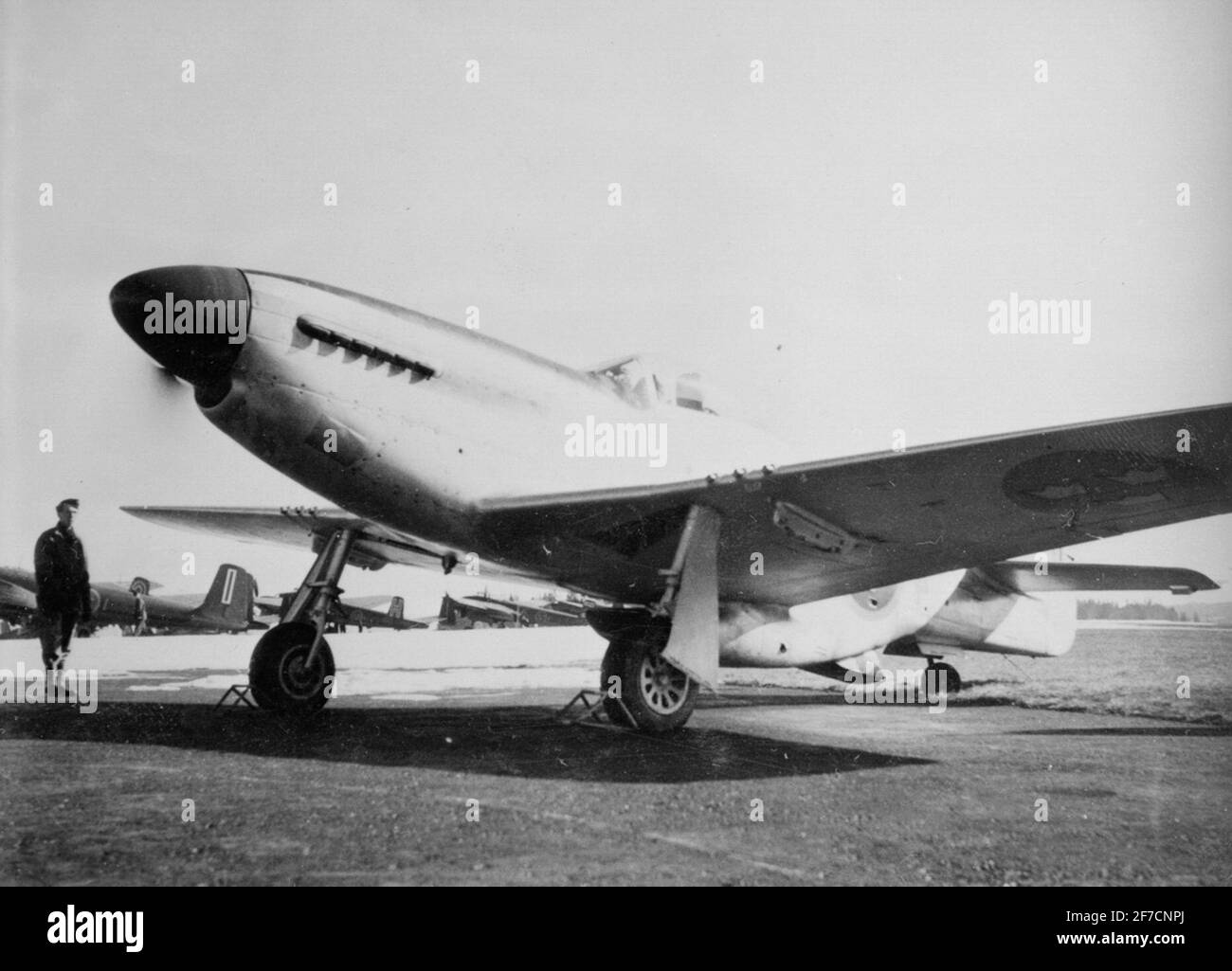 J 26 On an airfield motif: airplane J 26 on an airfield. Techniques ...