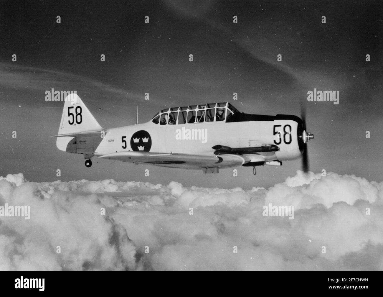 SK 16 fly over clouds, 1950 . airplane so -1 marked number 58 flying ...