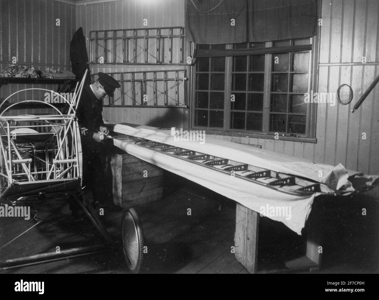 George Holmberg dress an aircraft wing with canvas, 1930s motif ...