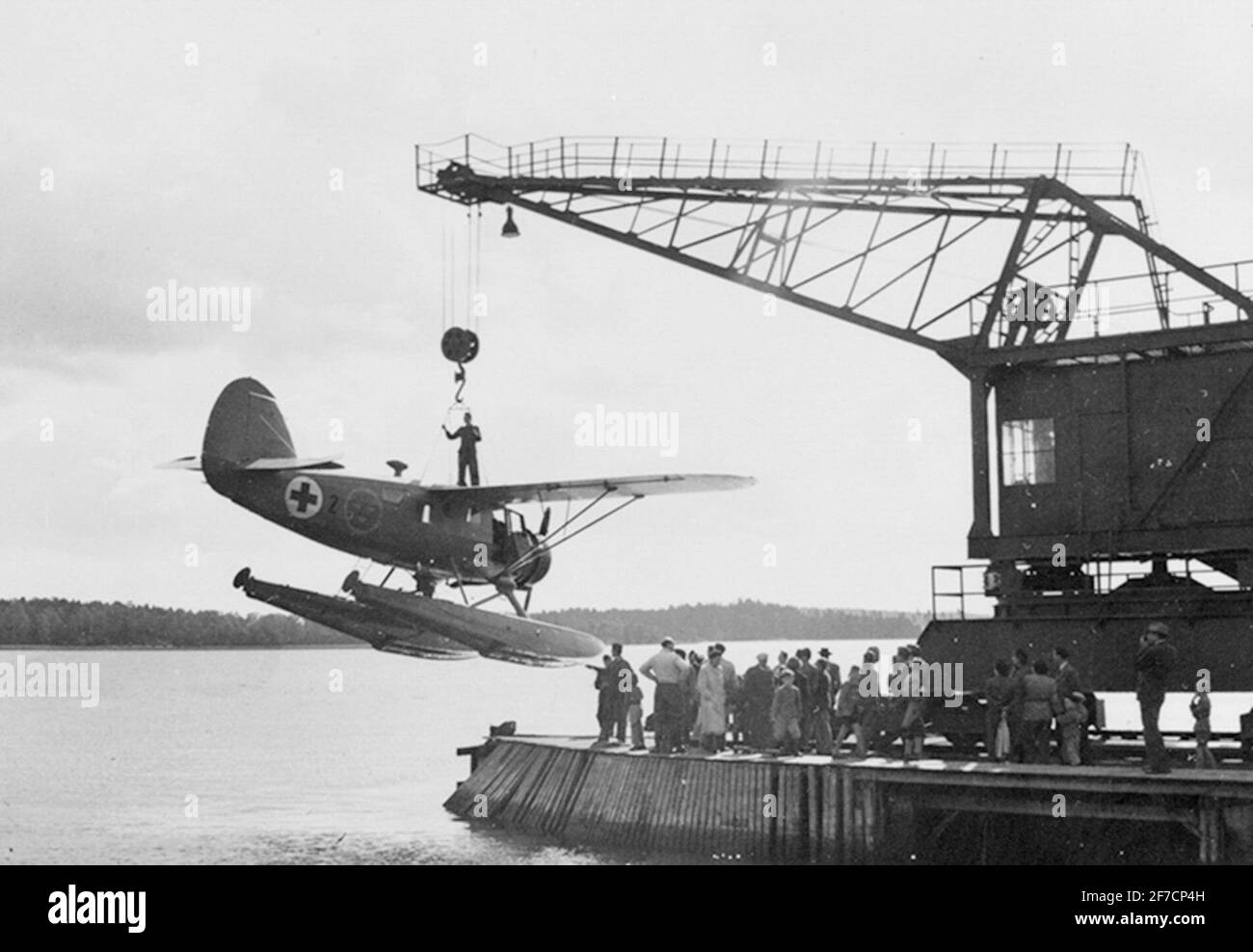Aircraft TP 78, lifted with crane to quay from water aircraft TP 78 ...