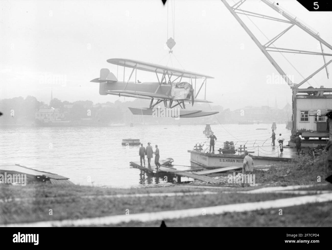 Aircraft lifted by crane, Galärvaret Airplane Heinkel HD 14 with floats ...