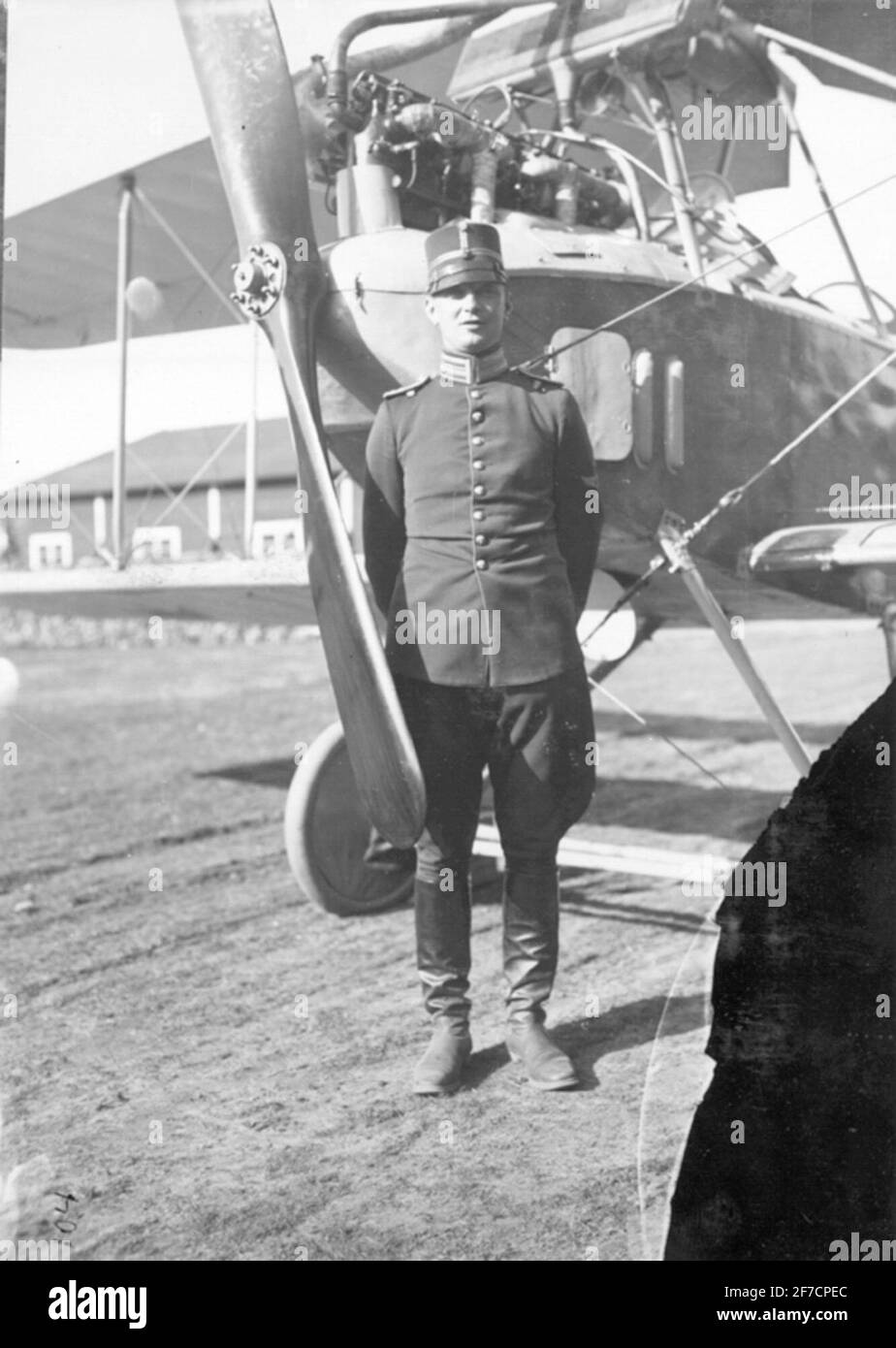 Portrait and aircraft Portrait of Lieutenant at 12 in front of aircraft ...