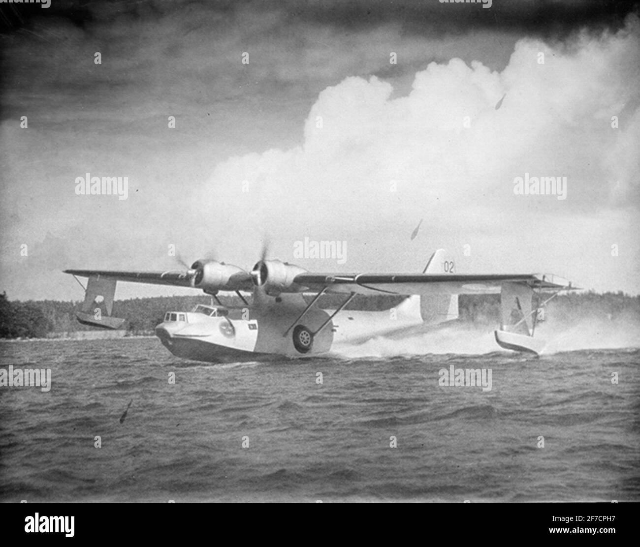 Airplane TP 47 Catalina on water Airplane TP 47 Catalina on water Stock ...