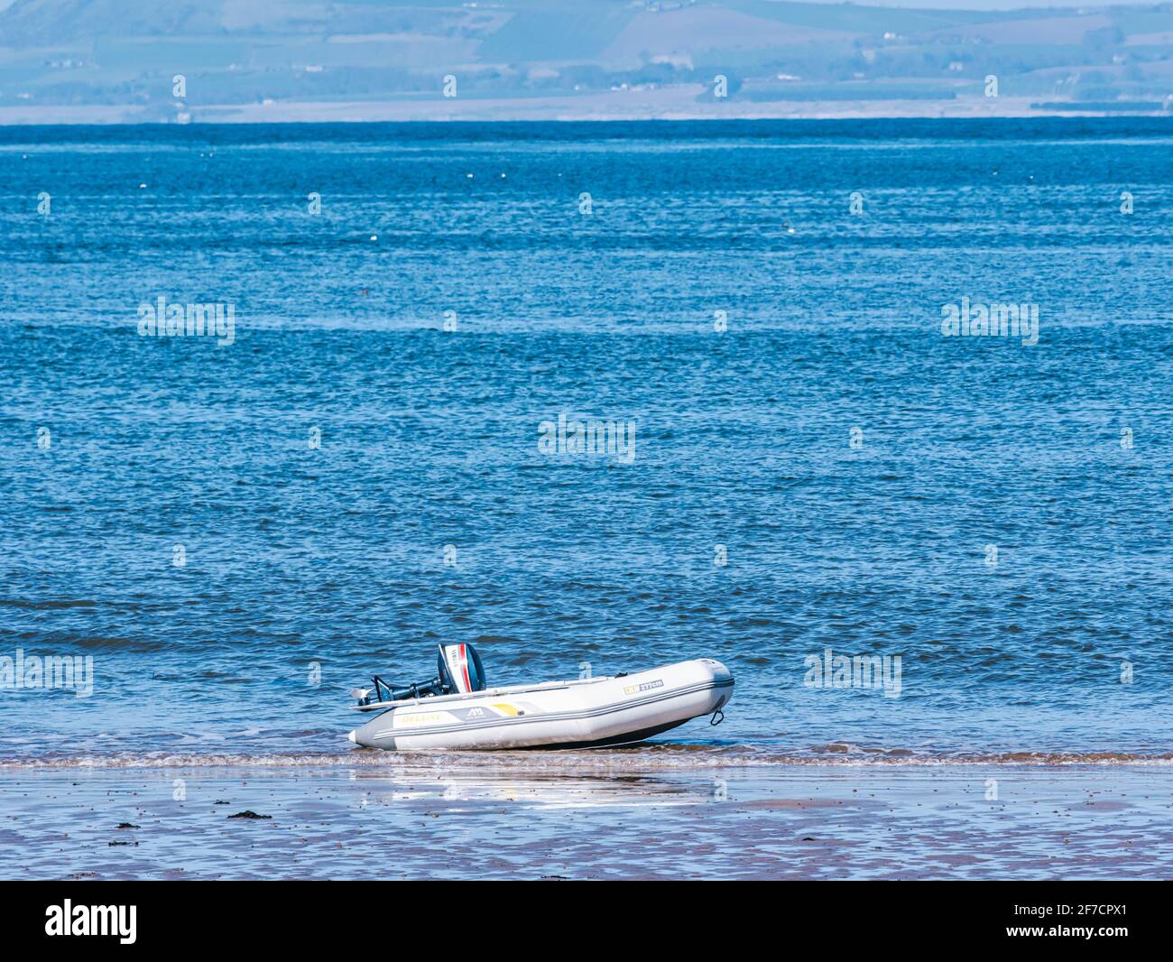 Inflatable rubber dinghy on beach hi-res stock photography and images ...