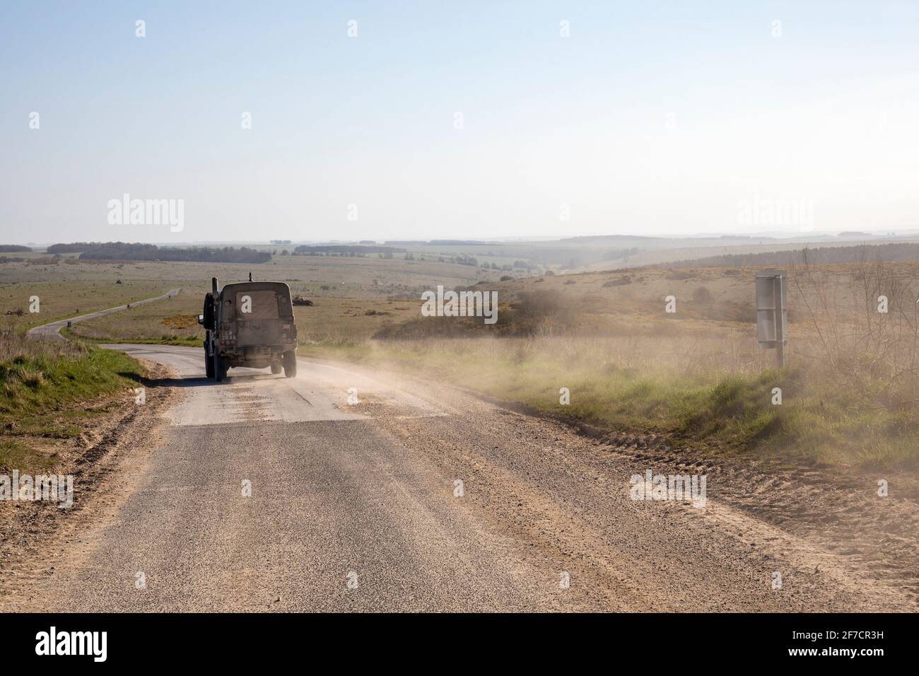 Military vehicle travelling towards Imber village on MOD military ...