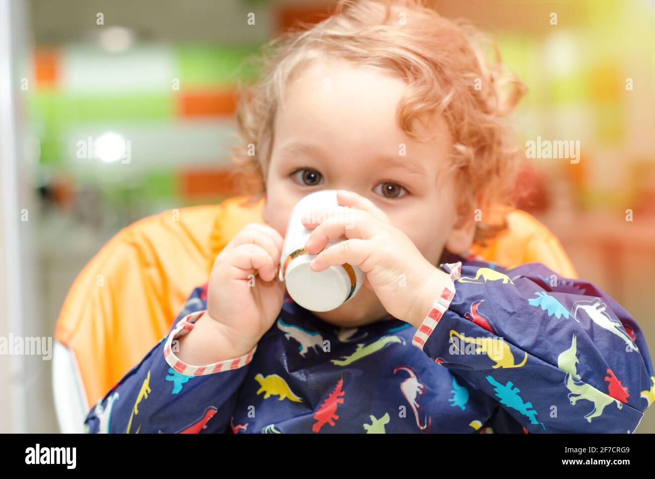 little child eating at home Stock Photo - Alamy