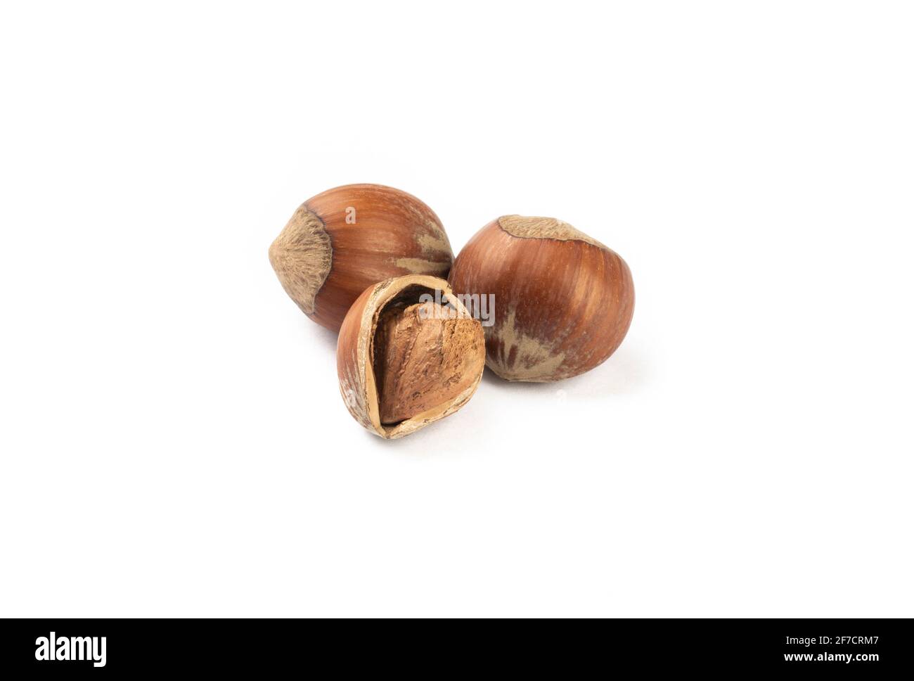 Hazelnuts with open nut isolated over white background Stock Photo - Alamy