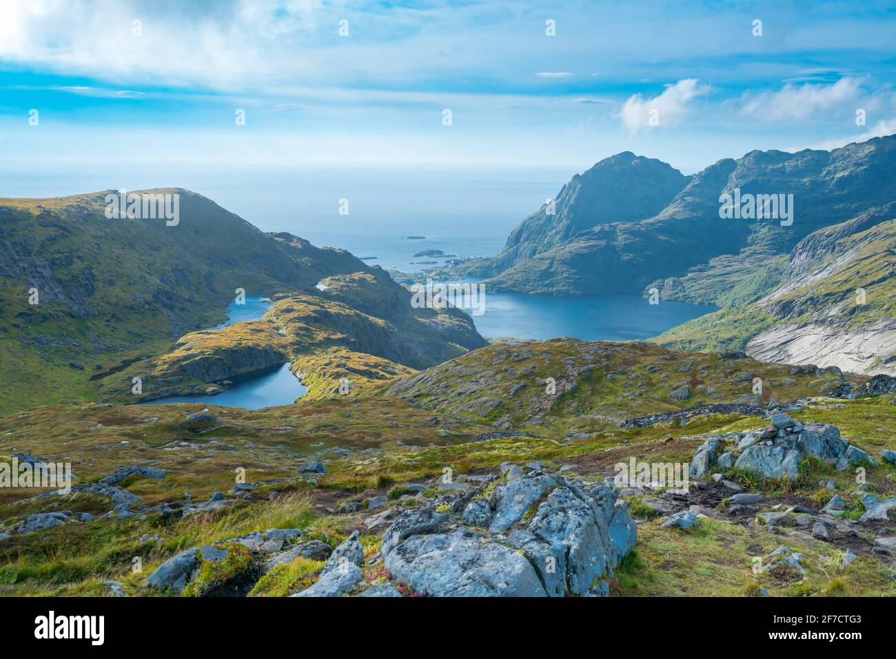 Mountains of Lofoten Island on a sunny arctic day. View from trail to ...