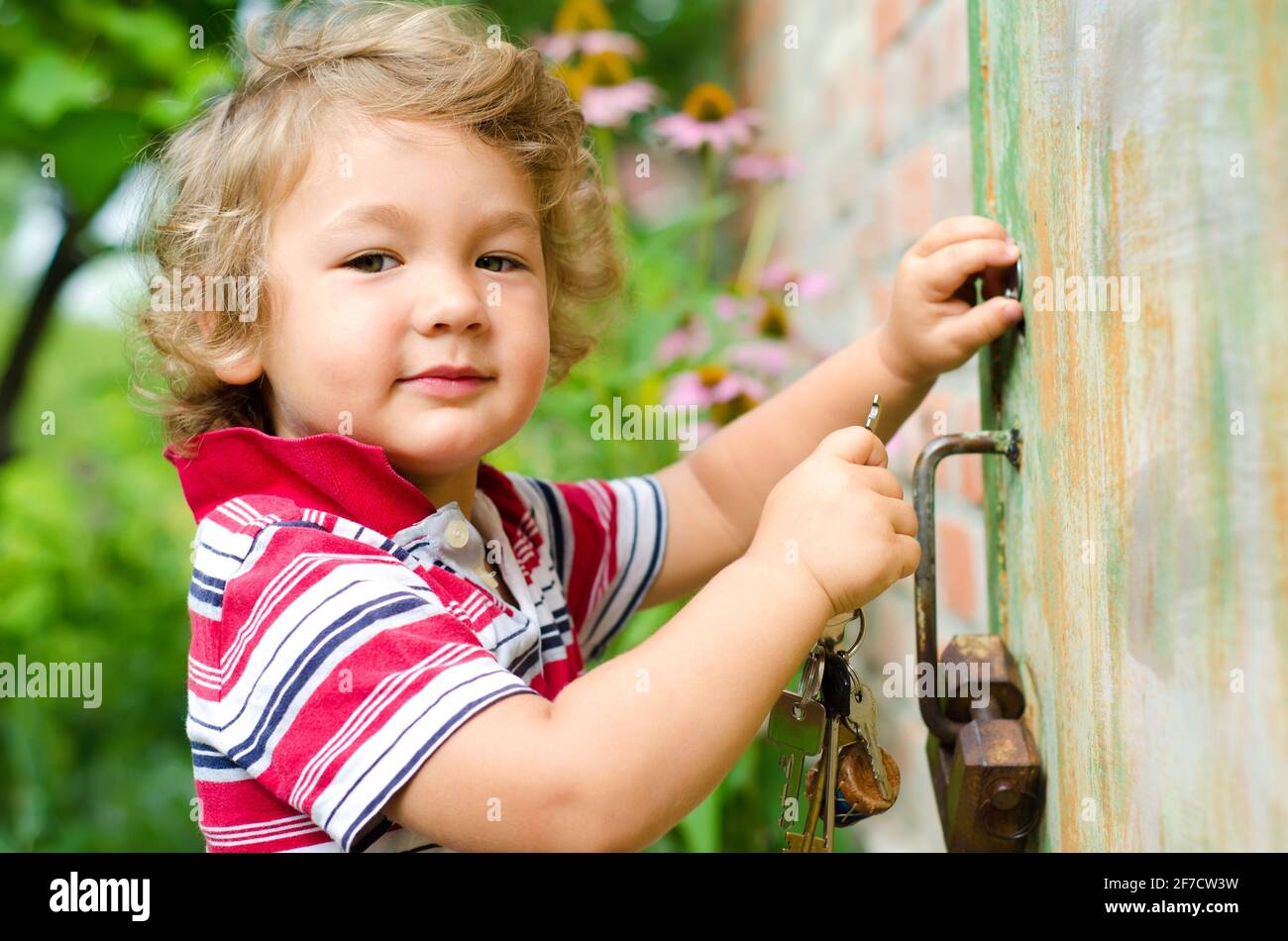 little boy with keys outdoors Stock Photo - Alamy