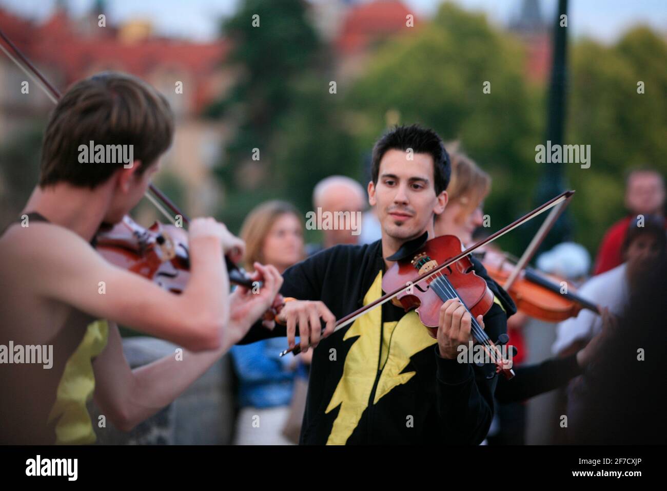 A group of street musicians playing on the famous Charles Bridge in ...