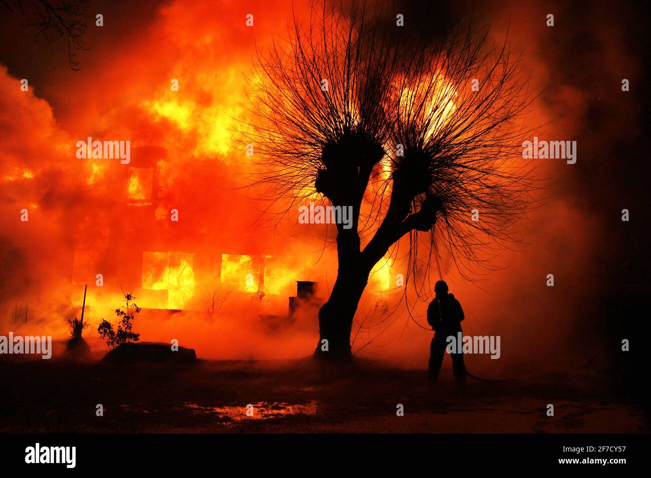 Fire flames evening fireman hi-res stock photography and images - Alamy