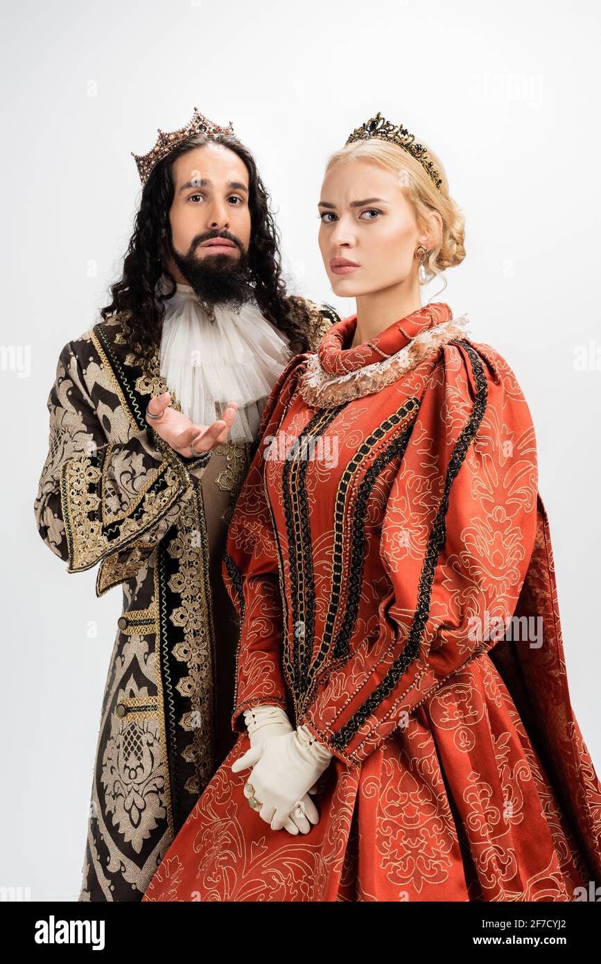 interracial king and queen in medieval clothing and crowns isolated on ...