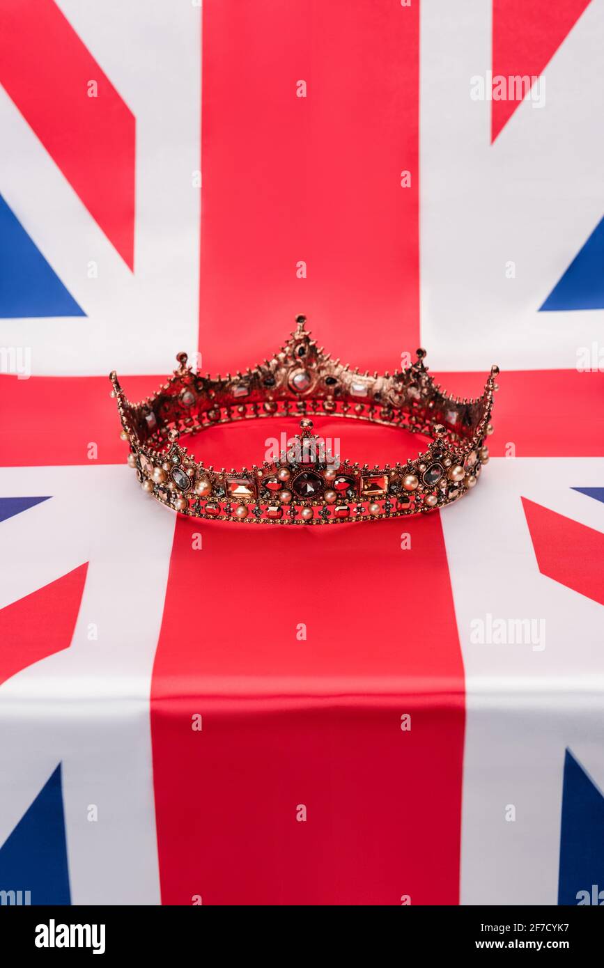 luxury royal crown on british flag Stock Photo - Alamy
