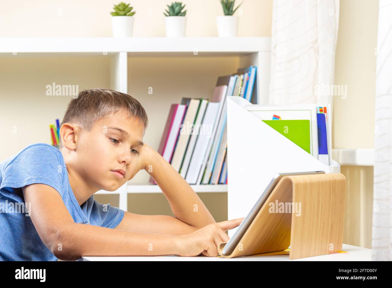 Teenage boy homework distracted hi-res stock photography and images - Alamy