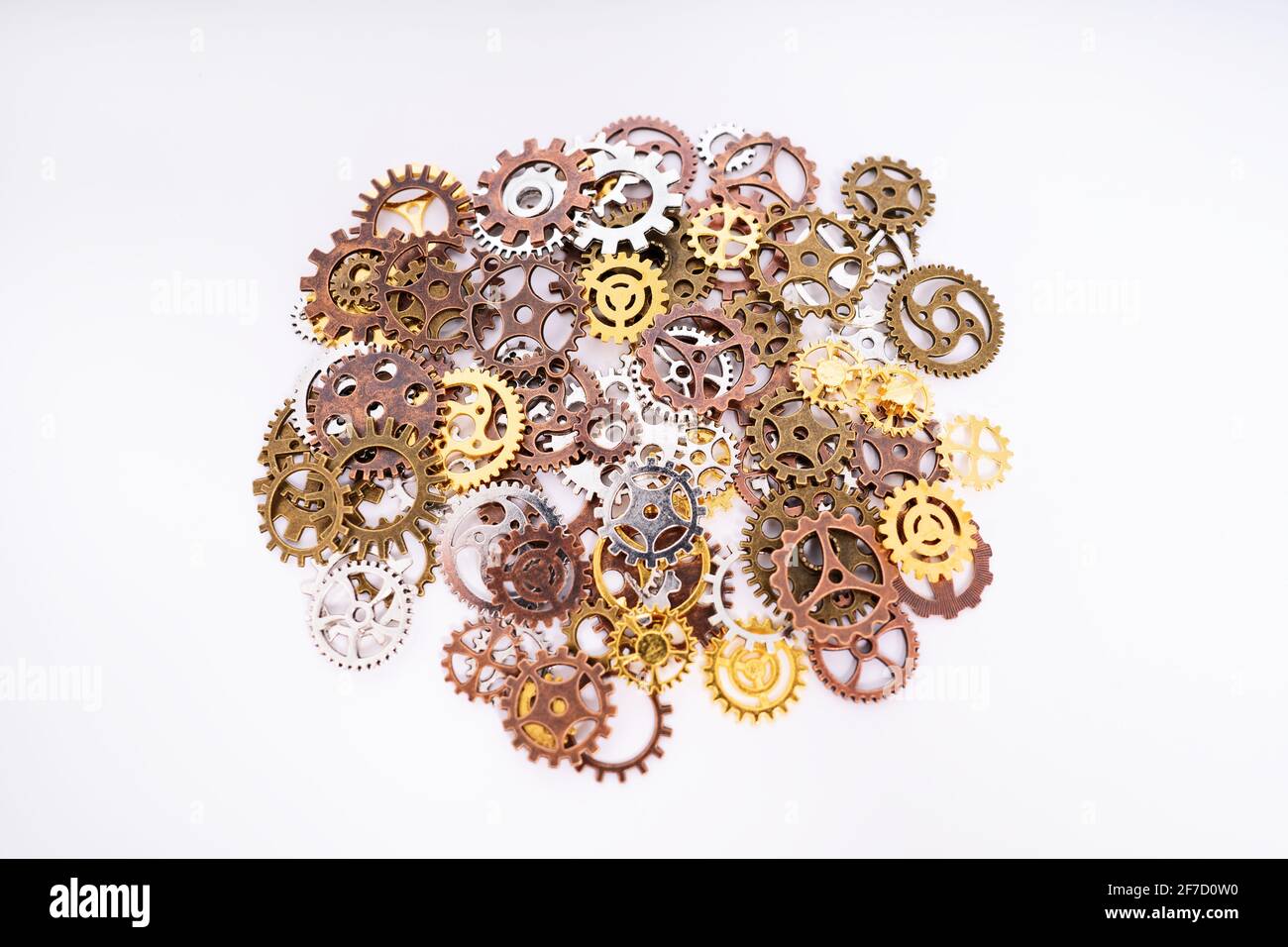 A pile of gear wheels and cogs in different colors. Future, gear, wheel ...