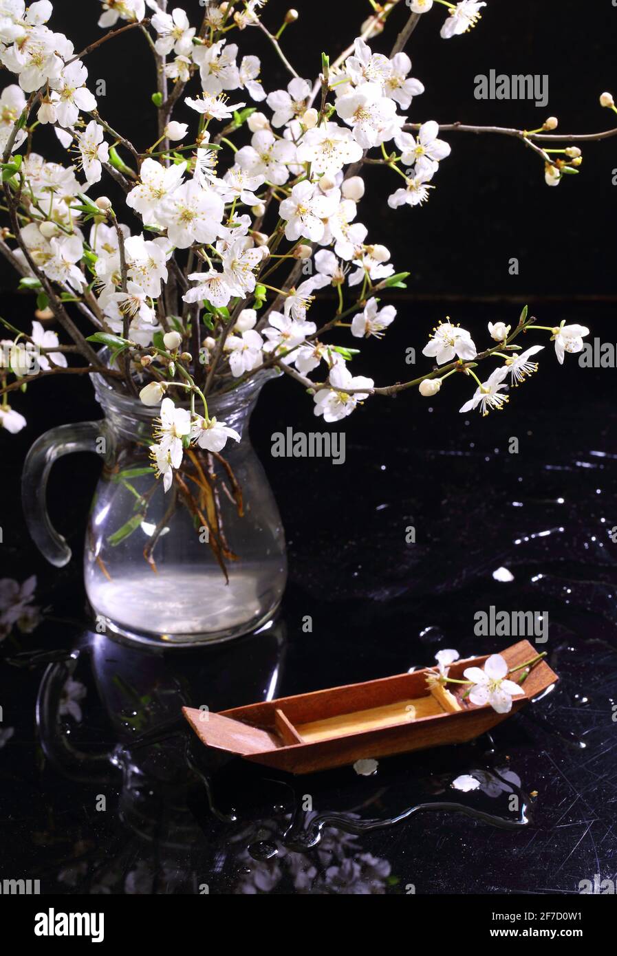 Still life with decorative wooden boat Stock Photo - Alamy