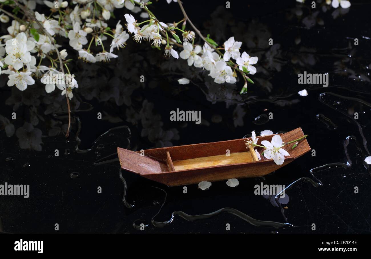 Still life with decorative wooden boat Stock Photo - Alamy