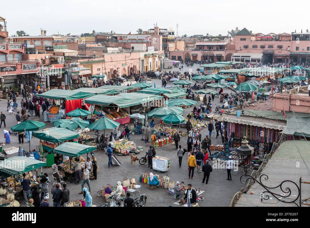 Market stands with green roofs and hustle and bustle at the famous ...