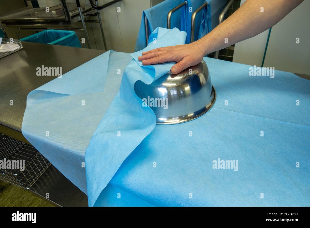 in an operating room a cleaned bowl is wrapped in blue paper Stock ...
