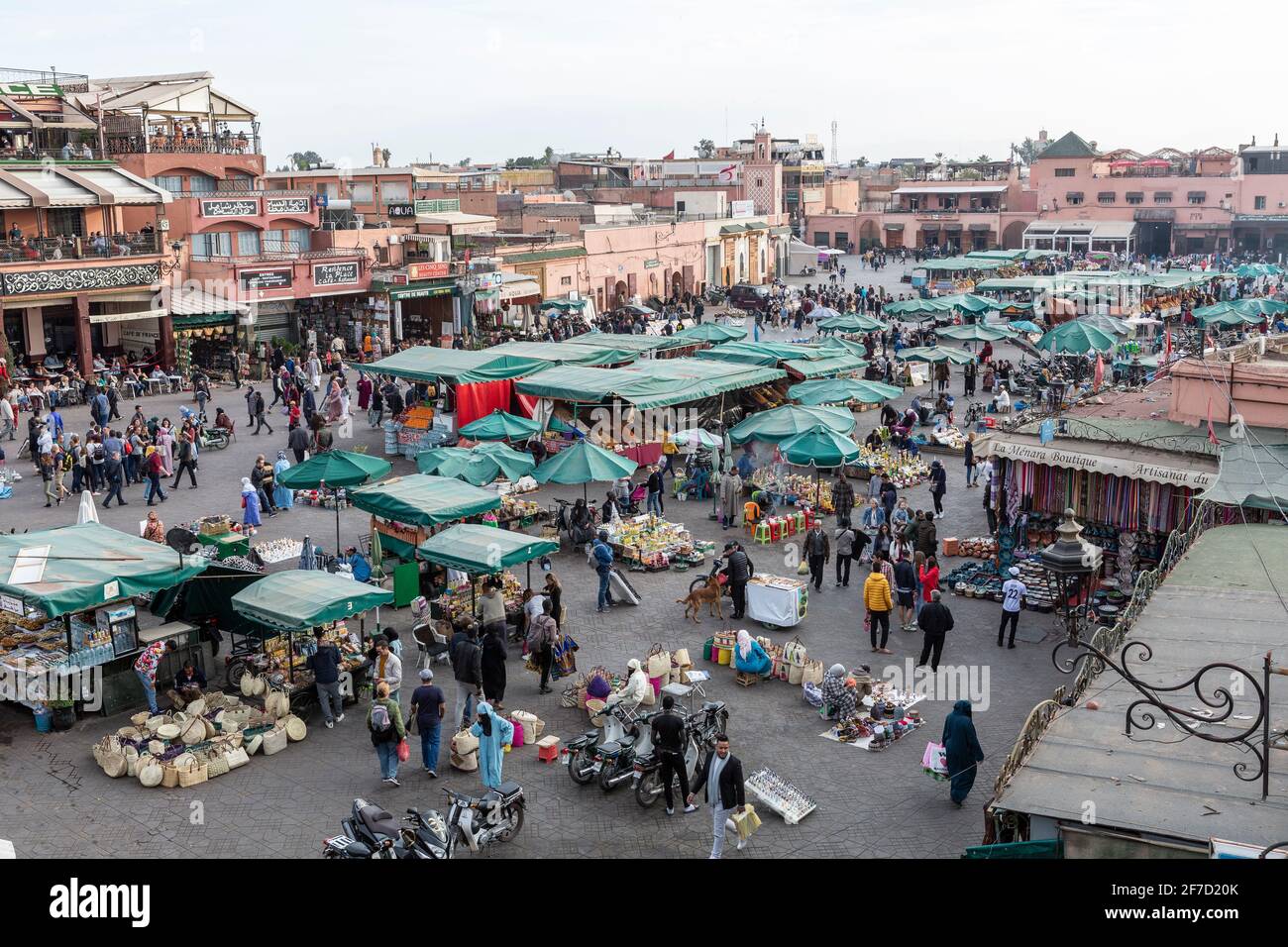 Market stands with green roofs and hustle and bustle at the famous ...